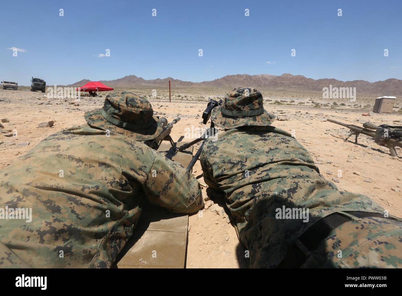 Sgt. Matthew Jazen, (left) a scout sniper and Sgt. Isaiah Robbins ...