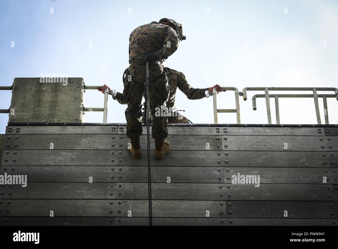 U.S. Marine Corps Lance Cpl. Colin M. Ash, a rifleman assigned to Alpha ...