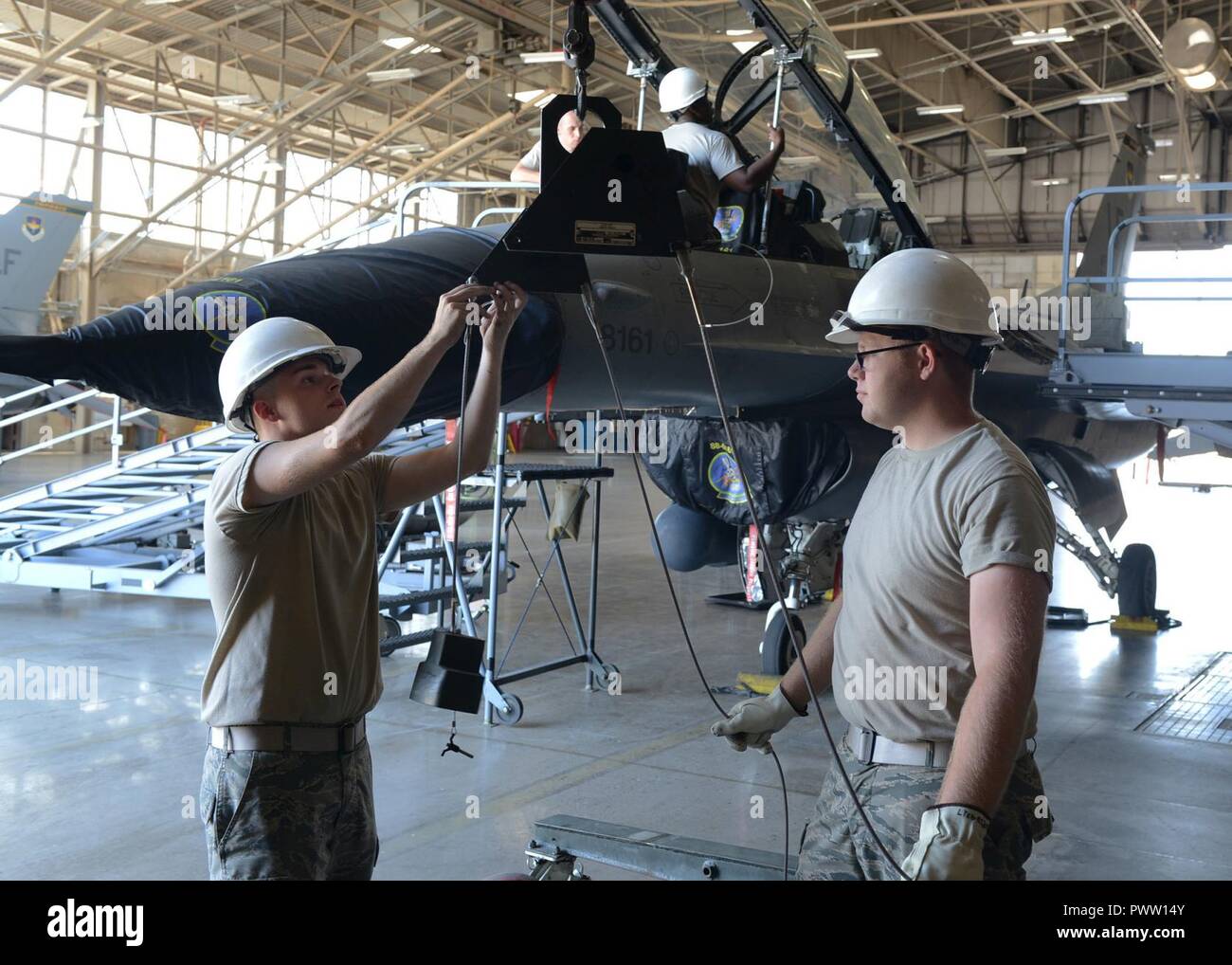 56th Component Maintenance Squadron Egress Airmen prepare a crane to ...