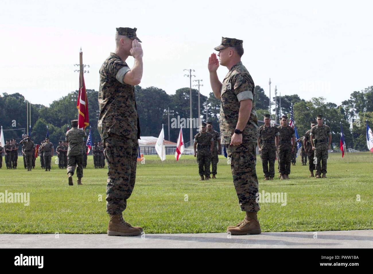 U.S. Marine Corps Col. Chandler P. Seagraves, right, commanding officer ...
