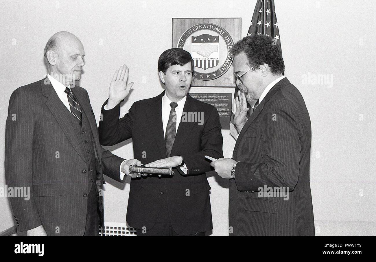 THERE ARE THREE MEN WHICH ONE OF THEM IS TAKING A OATH Stock Photo - Alamy