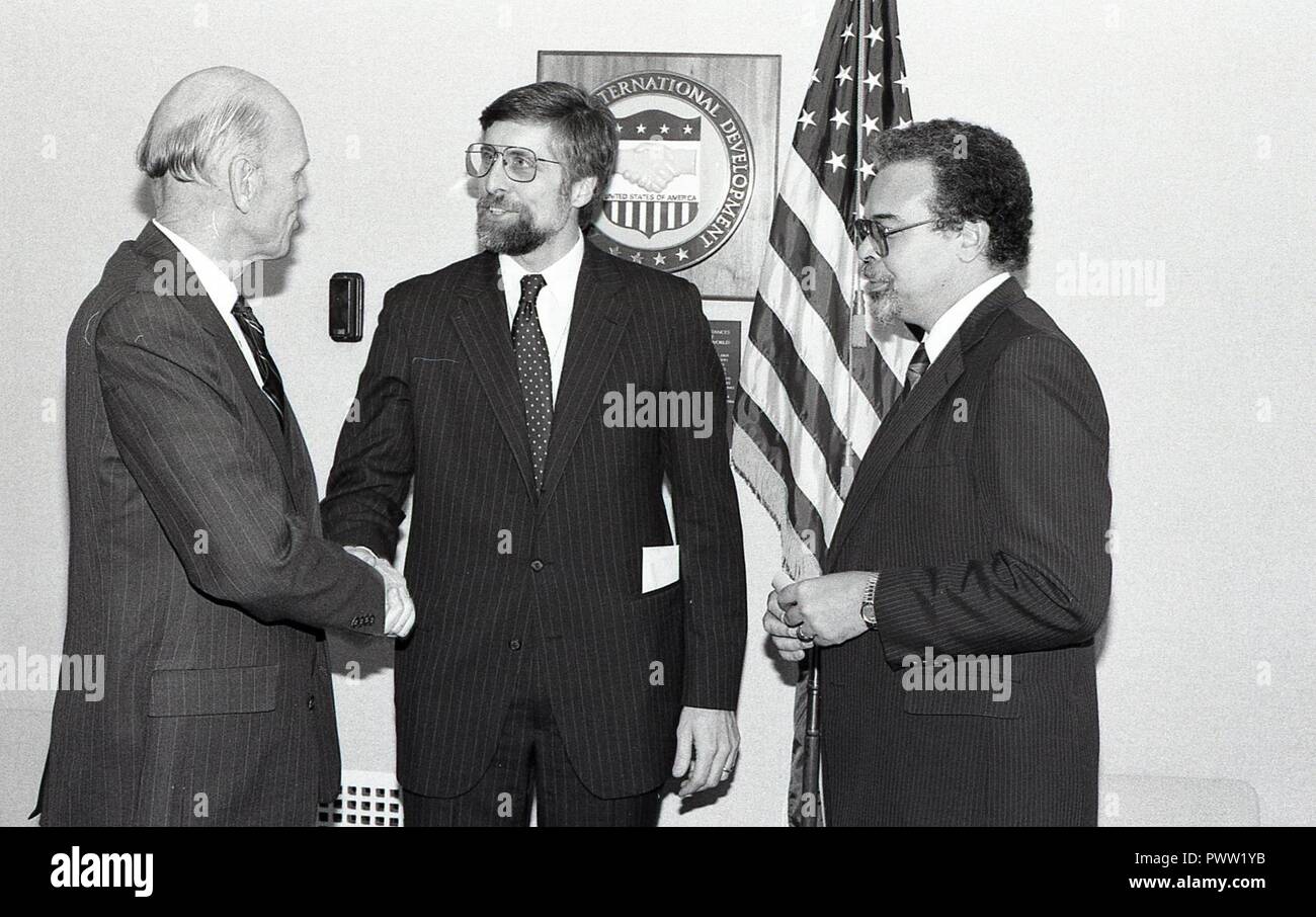 THREE MEN ARE GREETING EACH OTHER AFTER TAKING THE OATH Stock Photo - Alamy