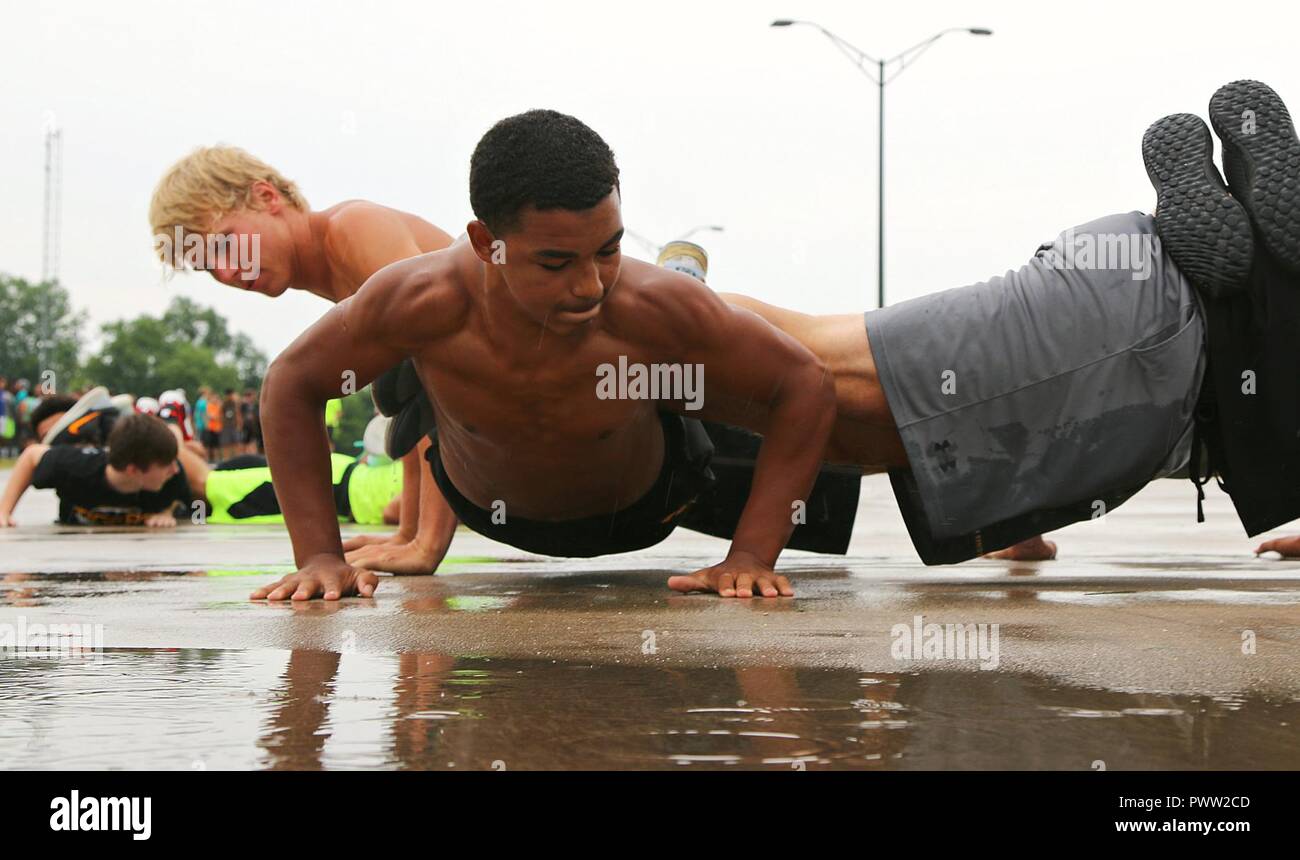 2017 Fitness Camp participants tackle team push-ups at Middletown, Iowa ...