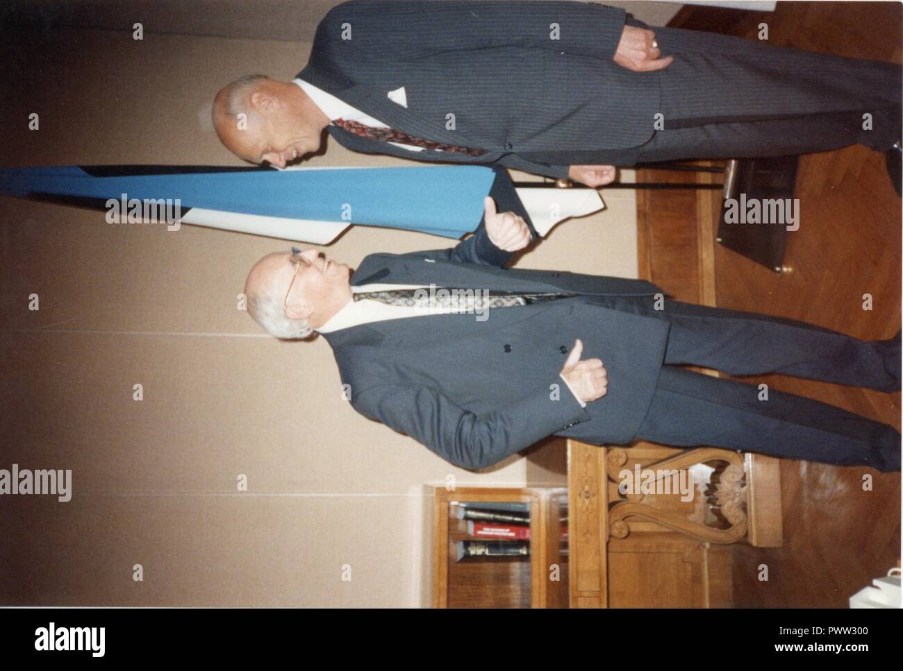 TWO MEN ARE HAVING A CONVERSATION Stock Photo - Alamy