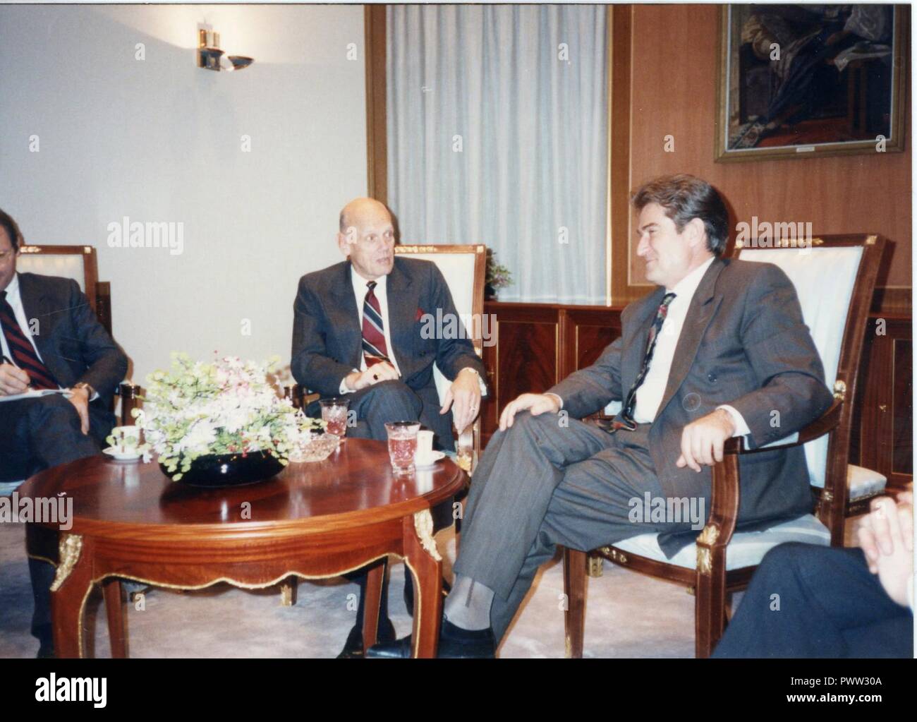 YOU HAVE A GROUP OF MEN SITTING IN A ROOM HAVING A CONVERSATION Stock ...