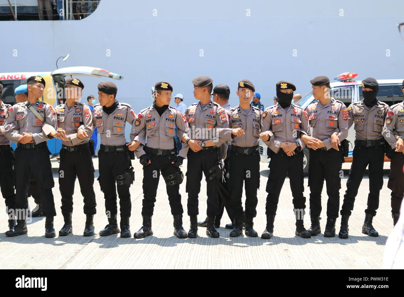 A group of police officers lined up neatly Stock Photo - Alamy