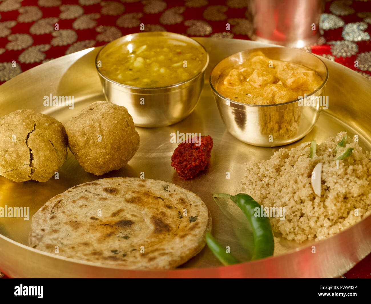 A FULL TRADITIONAL RAJASTHANI MEAL/ RAJASTHANI THALI: LEFT TO RIGHT ...