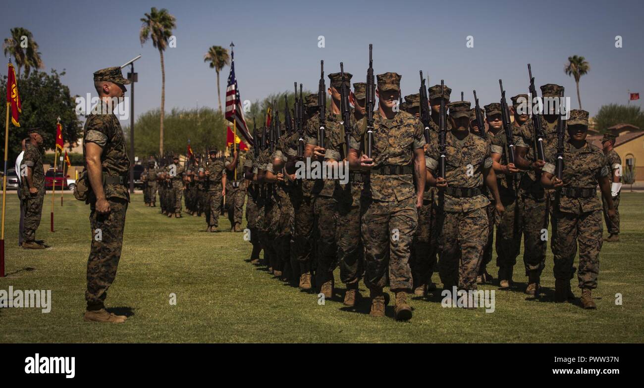 U.S. Marines complete the change of command ceremony with a pass in ...