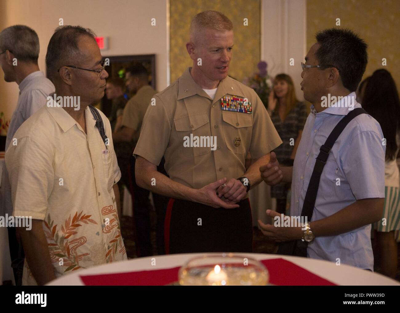 U.S. Marine Corps Brig. Gen. Paul Rock speaks to guest at a change of ...