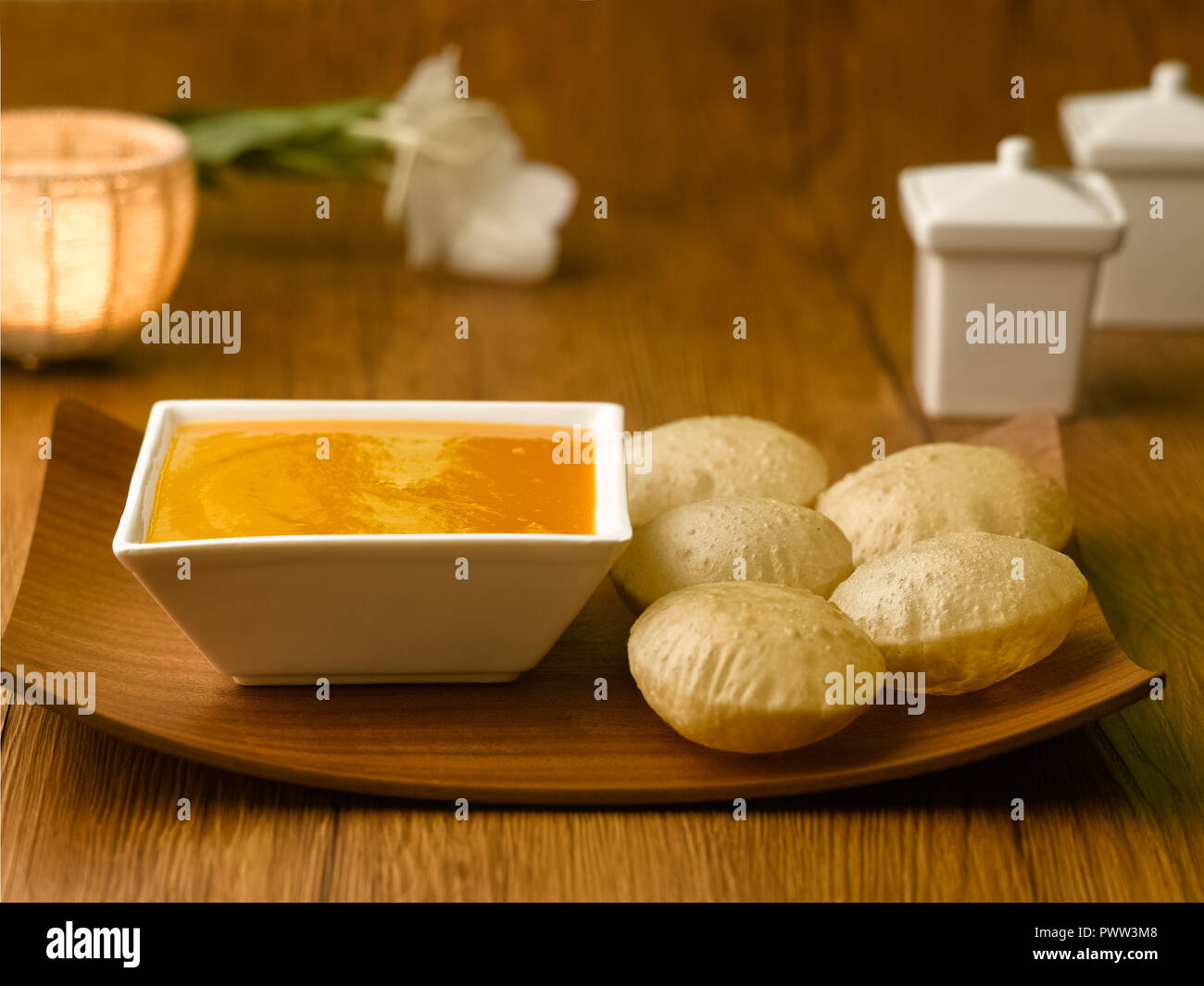 MANGO JUICE/ AAM RAS AND PURI/ PURI, FRIED PUFFED BREAD MADE FROM WHEAT ...