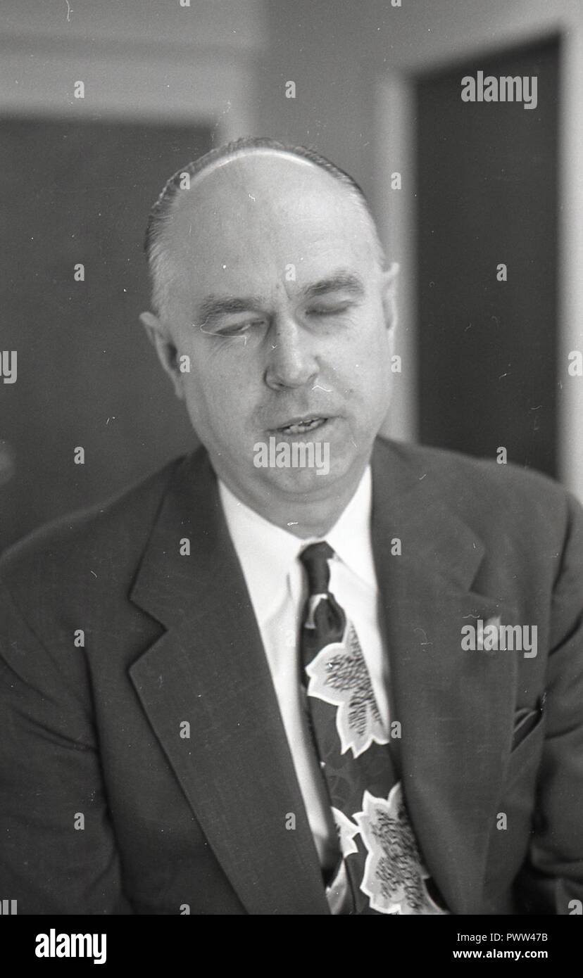 A PHOTO OF E.D.WHITE WITH A SUIT AND TIE AND HIS EYES CLOSE Stock Photo ...