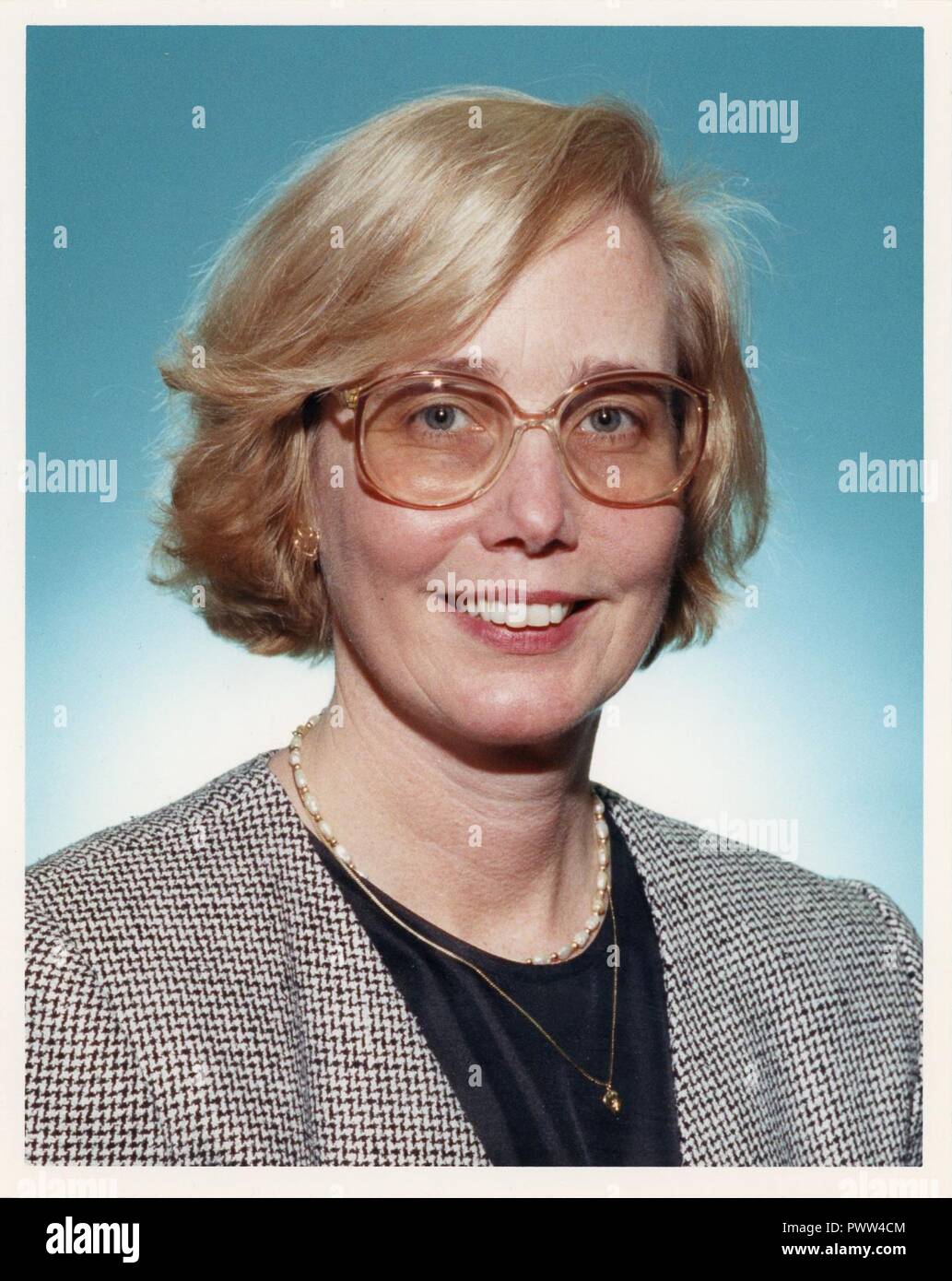 THIS IS A PHOTO OF JOAN WOLFE SMILING WITH HER GLASSES ON Stock Photo ...