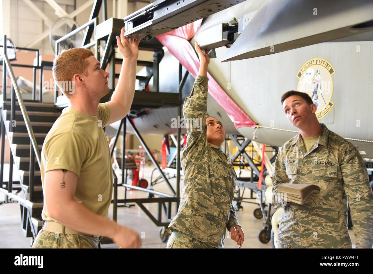 Airmen Anthony Williams, Tyana Haylock and Bradd Hammond, 363rd ...