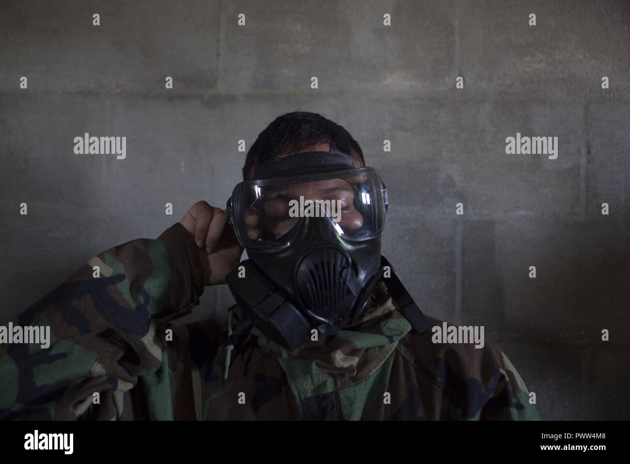 A Marine assigned to Combat Logistics Battalion 3 clears his M50 joint ...