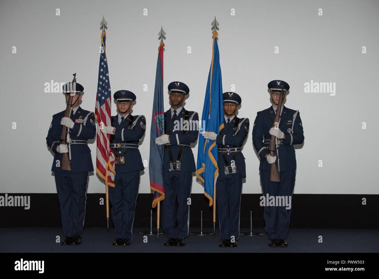 Andersen Air Force Base's Honor Guard presents the colors during the ...