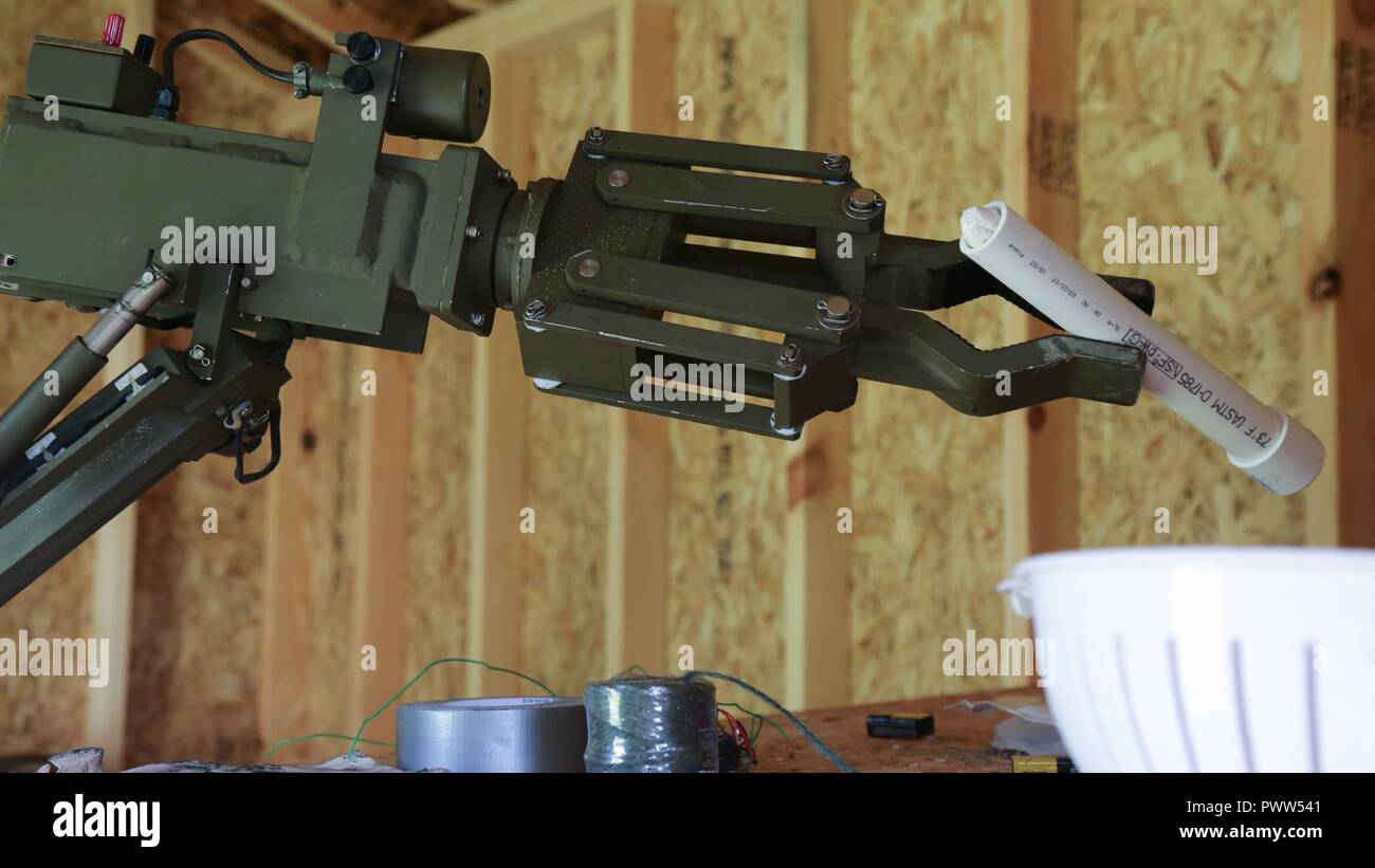 A Mini ANDROS II Robot, controlled by personnel assigned to Rapides ...