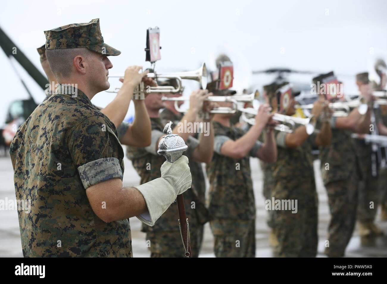 U.S. Marine Corps III Marine Expeditionary Force band performs at a change of command ceremony ...