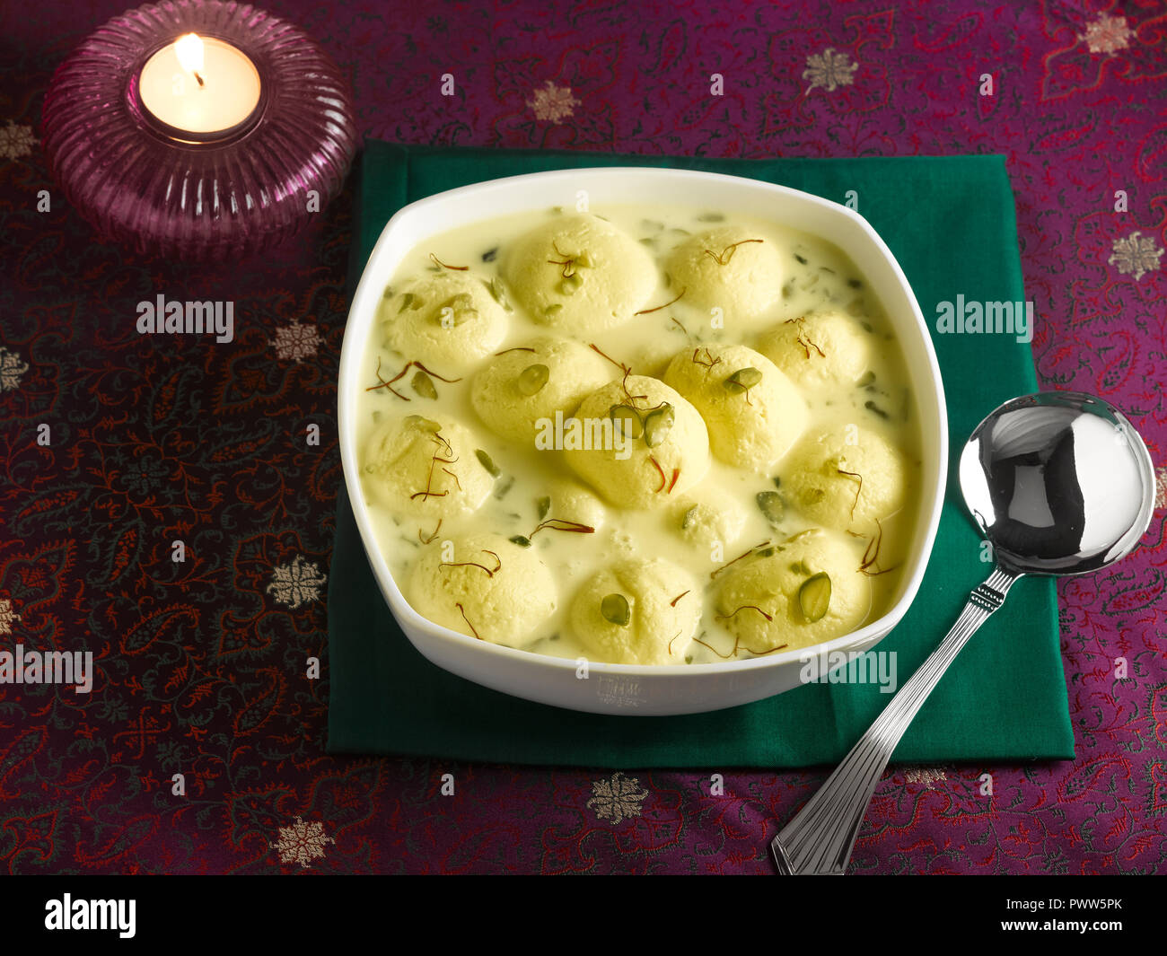 RASMALAI, AN INDIAN DESSERT MADE FROM COTTAGE CHEESE SOAKED IN SWEET ...