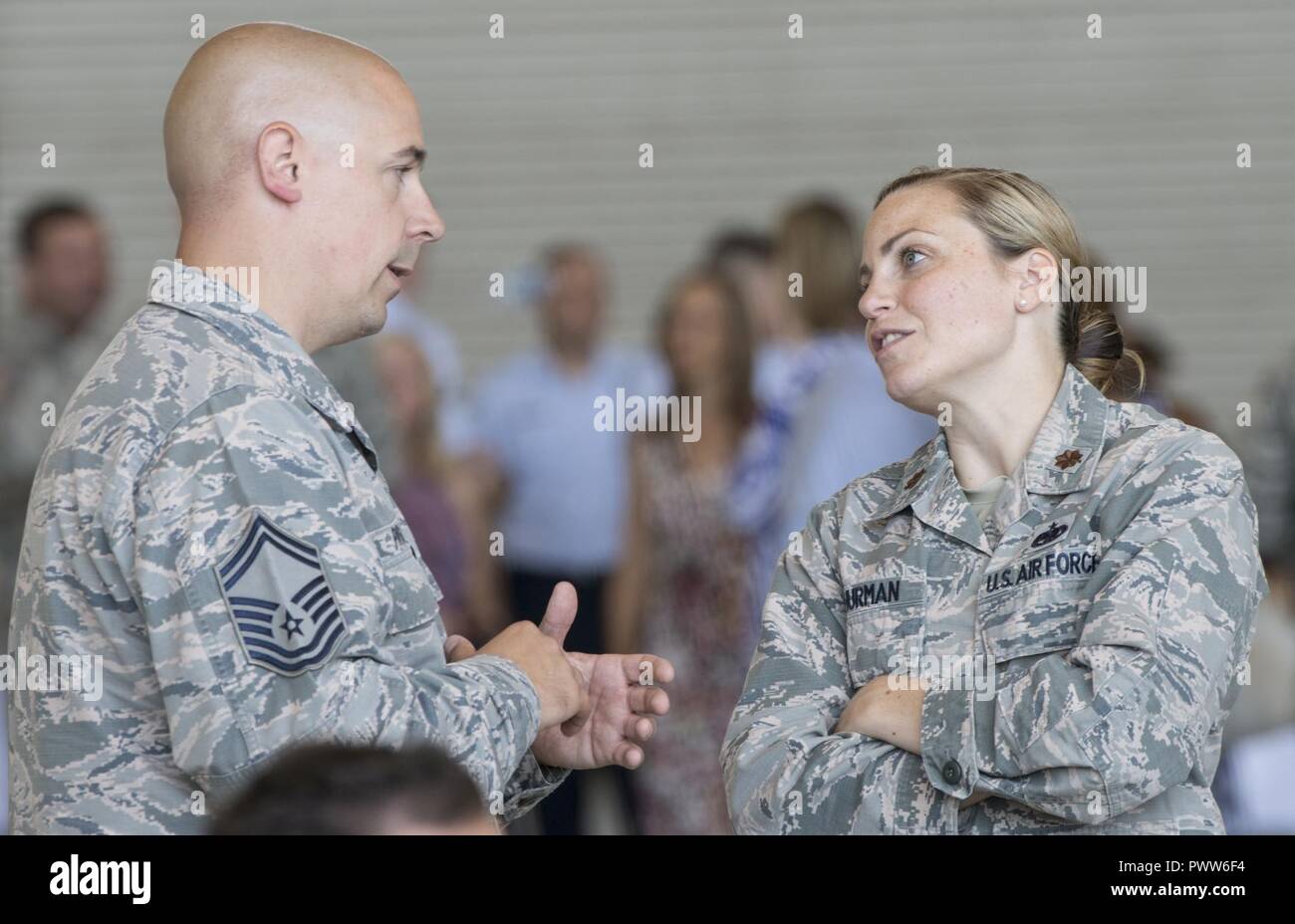 With three heavy-lift airships serving as a backdrop, family, friends ...