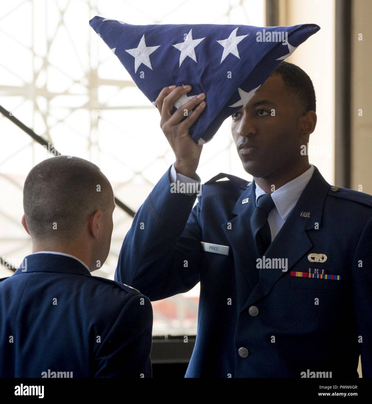 With three heavy-lift airships serving as a backdrop, family, friends ...
