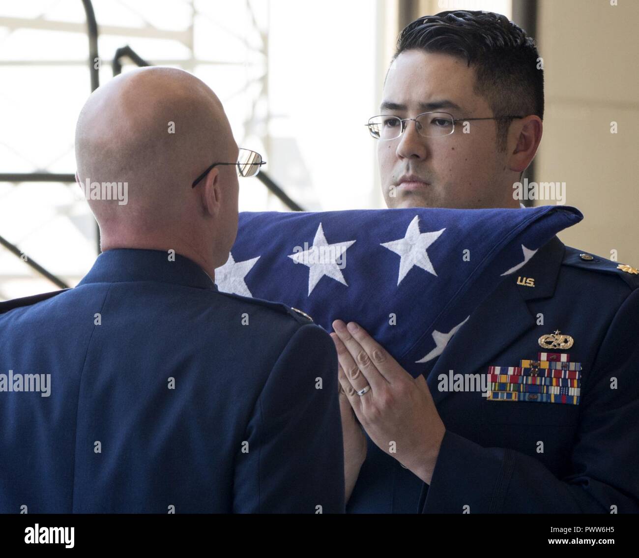 With three heavy-lift airships serving as a backdrop, family, friends ...
