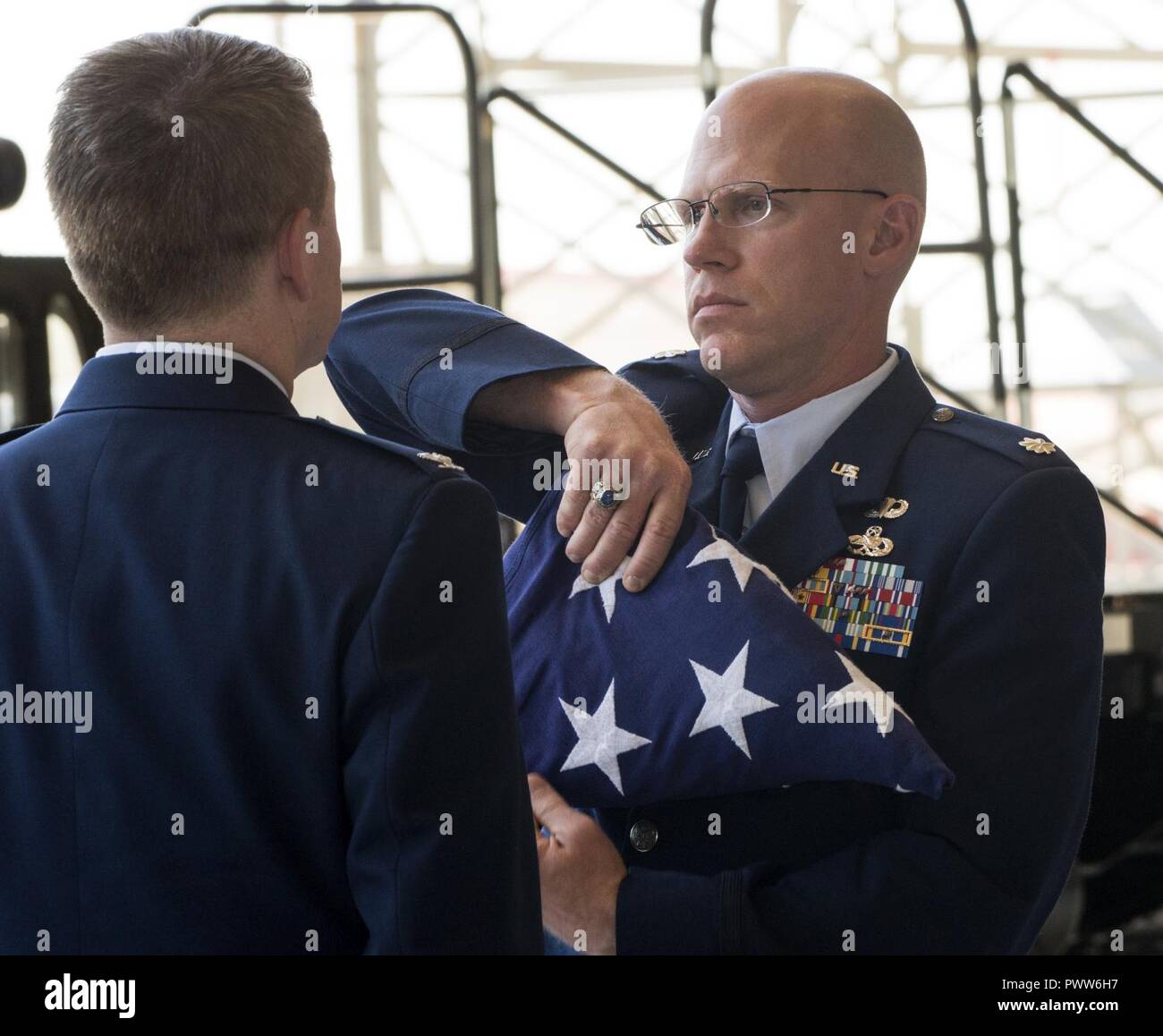 With three heavy-lift airships serving as a backdrop, family, friends ...