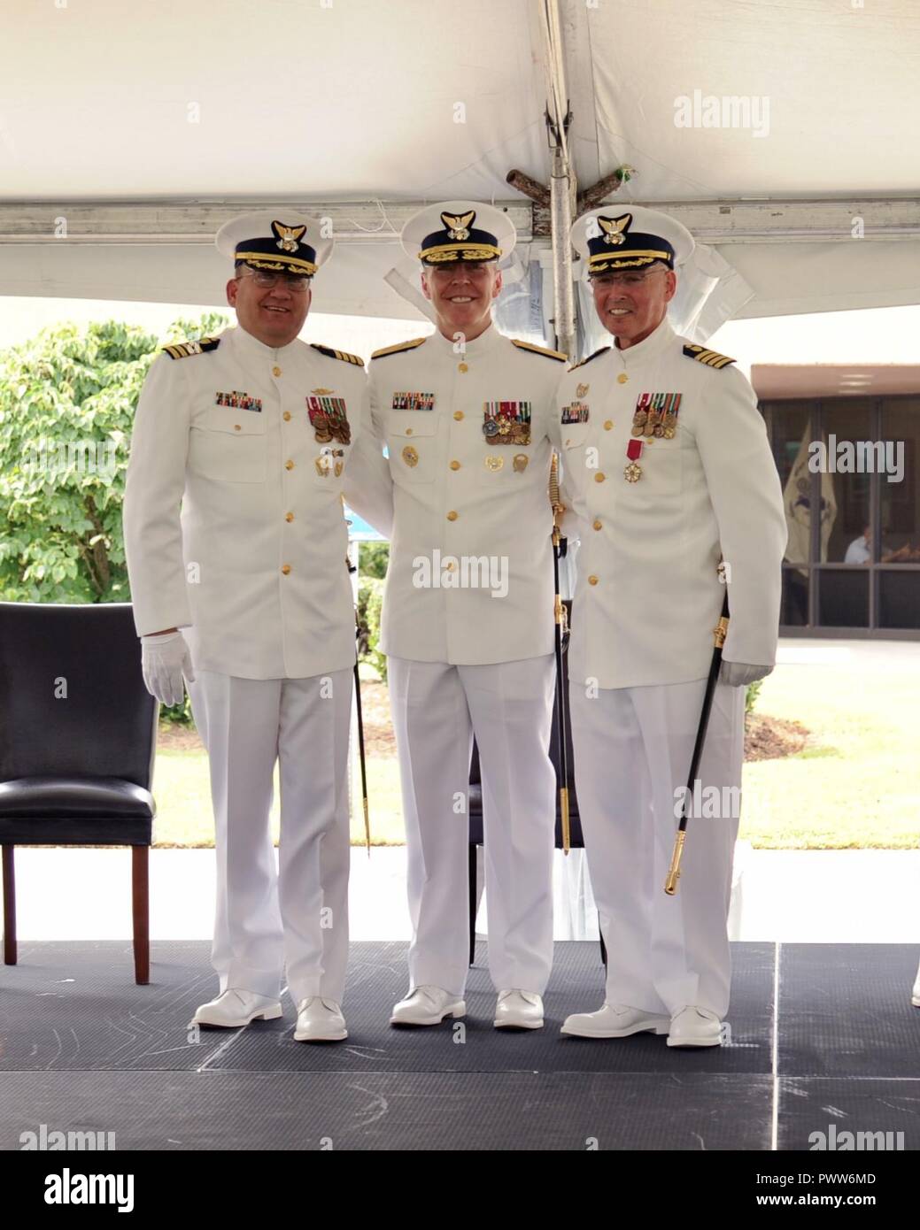Coast Guard Capt. Michael Nasitka, Rear Adm. Kevin Lunday and Capt ...