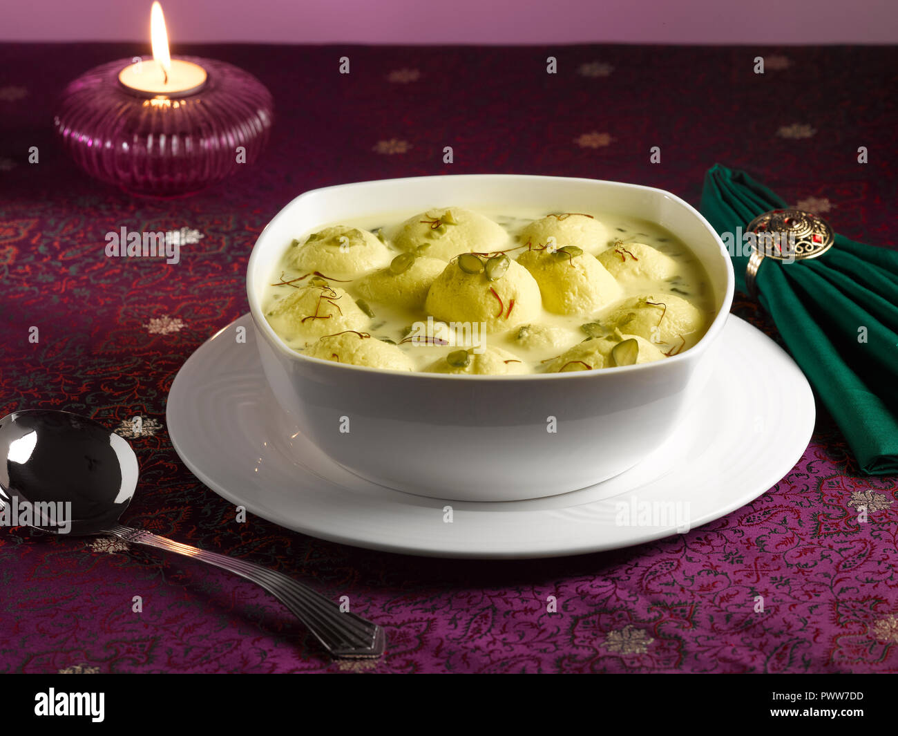 RASMALAI, AN INDIAN DESSERT MADE FROM COTTAGE CHEESE SOAKED IN SWEET ...