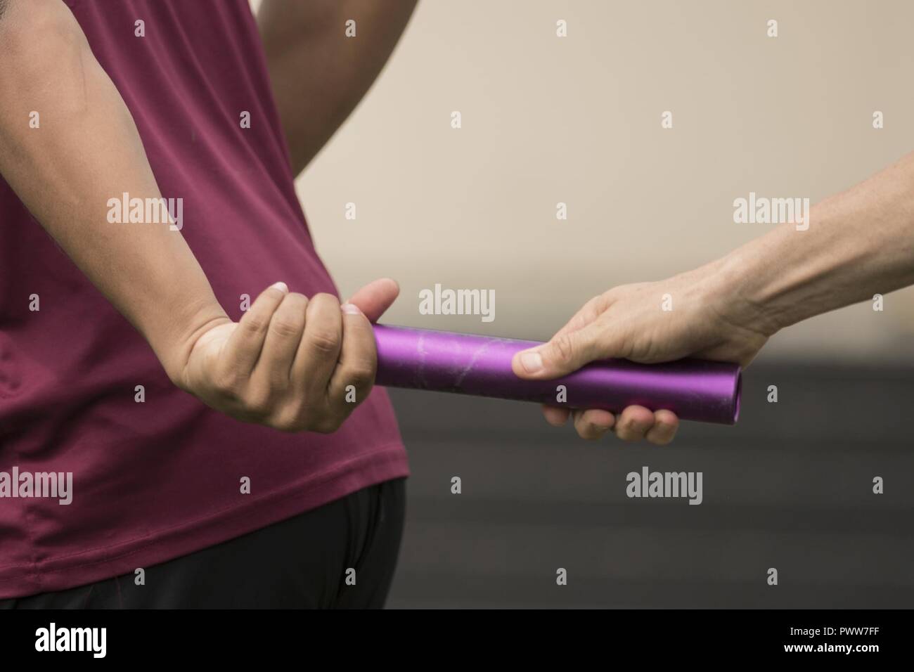 Handing off baton hi-res stock photography and images - Alamy