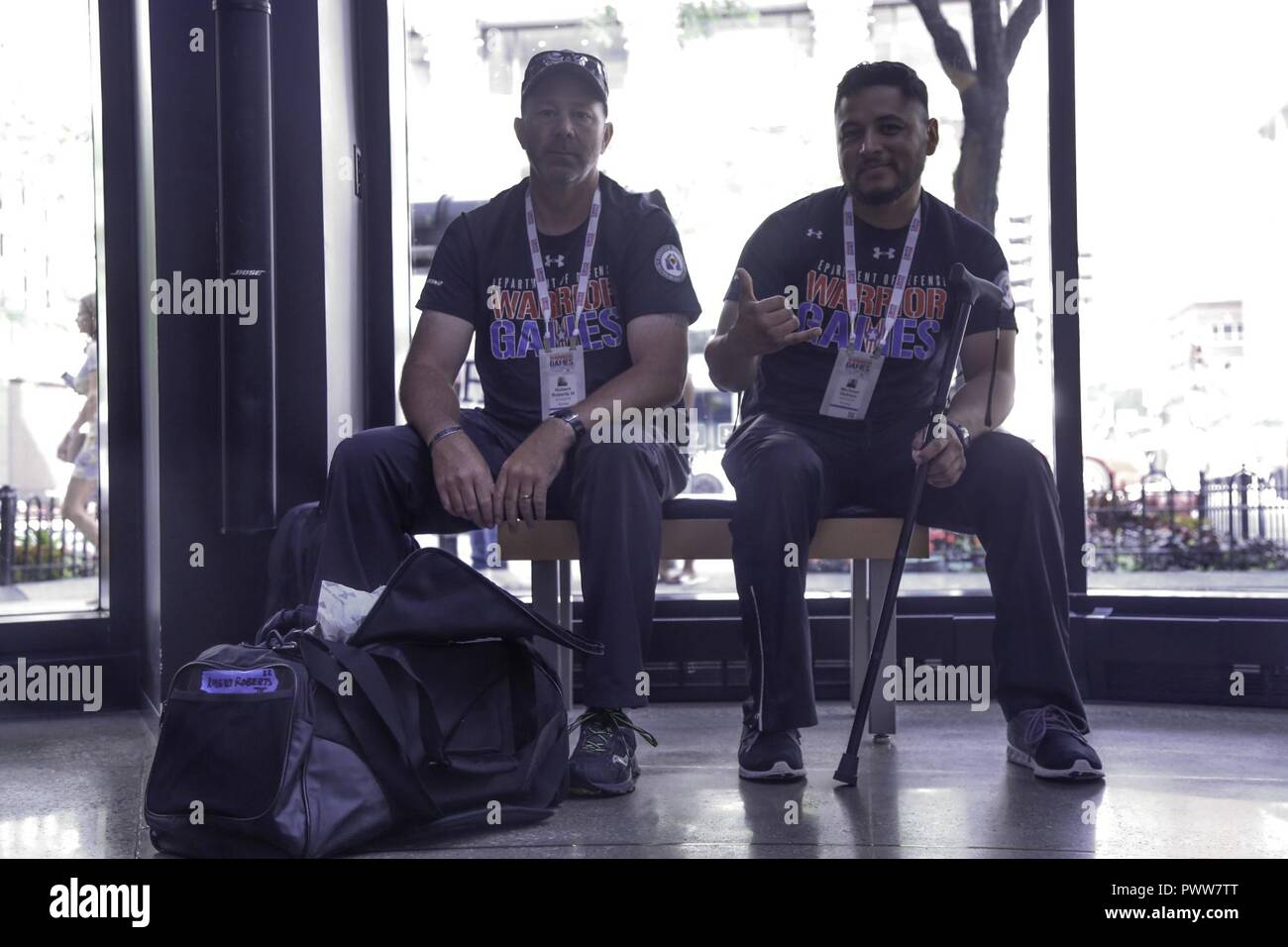 U.S. Army veterans Robert Roberts III and Michael Helmen recieve their ...