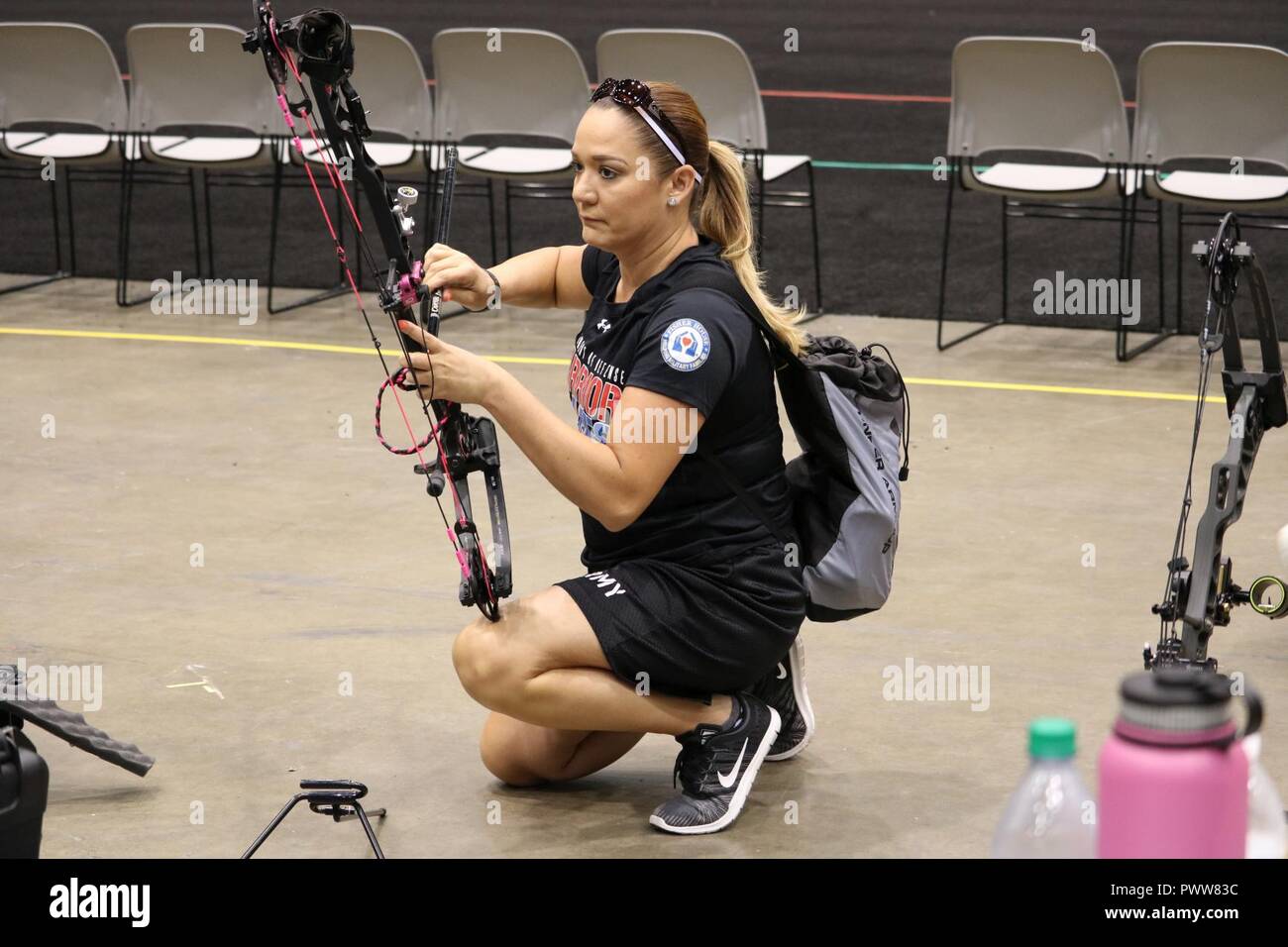 U.S. Army veteran Michelle Sanchez, San Antonio, Texas, adjusts her ...