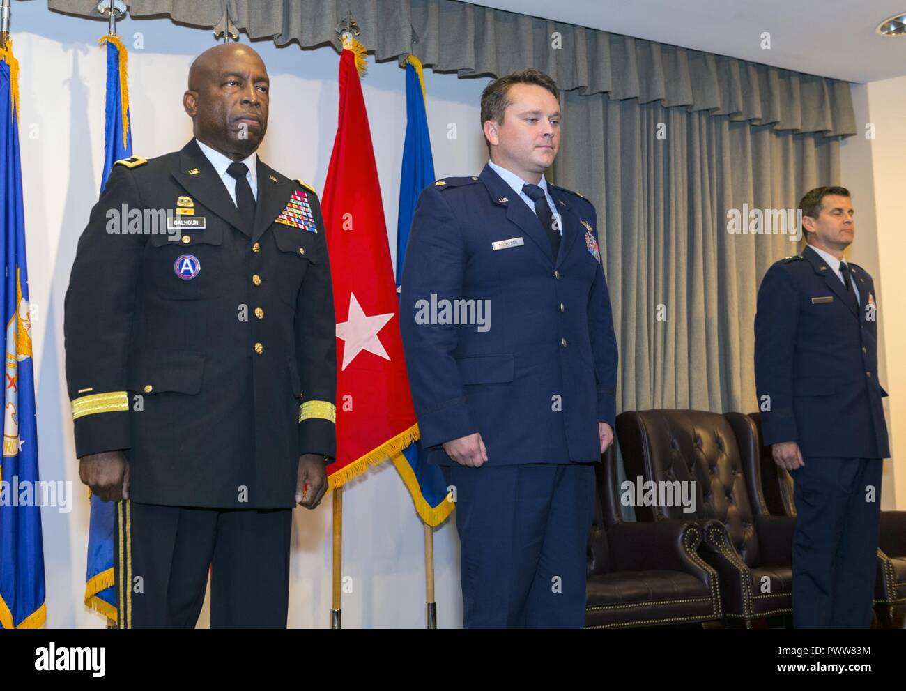 Maj. Gen. Michael Calhoun, the Adjutant General of Florida, stands with ...