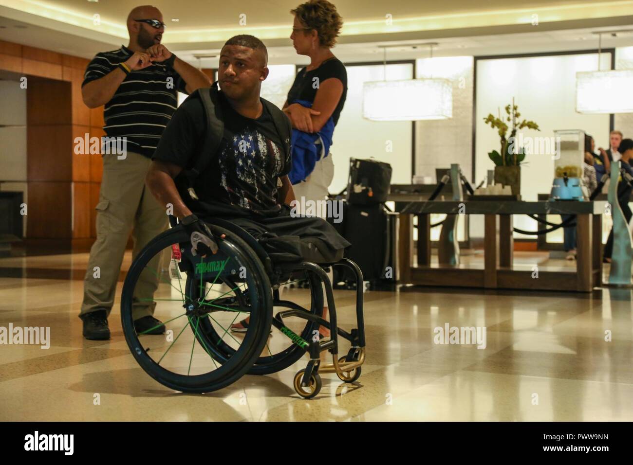 U.S. Army veteran Ryan Major, from Towson, Md. arrives at the hotel ...