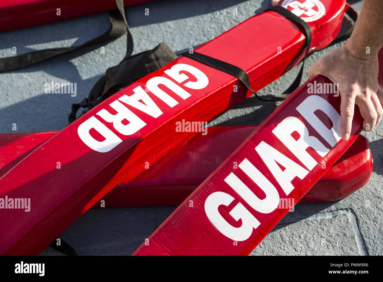 A U.S. Marine assigned to the 2nd Marine Aircraft Wing picks up a ...