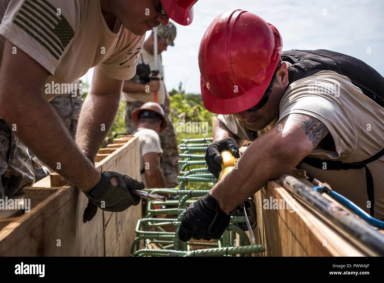 Master Sgt. Jeremy Reynoso (right) and Technical Sgt. Christopher ...