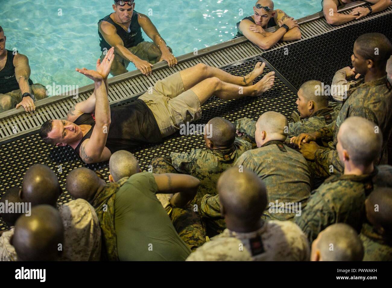 U.S. Marine Corps Staff Sgt. Andrew S. Slater, a swim instructor with ...