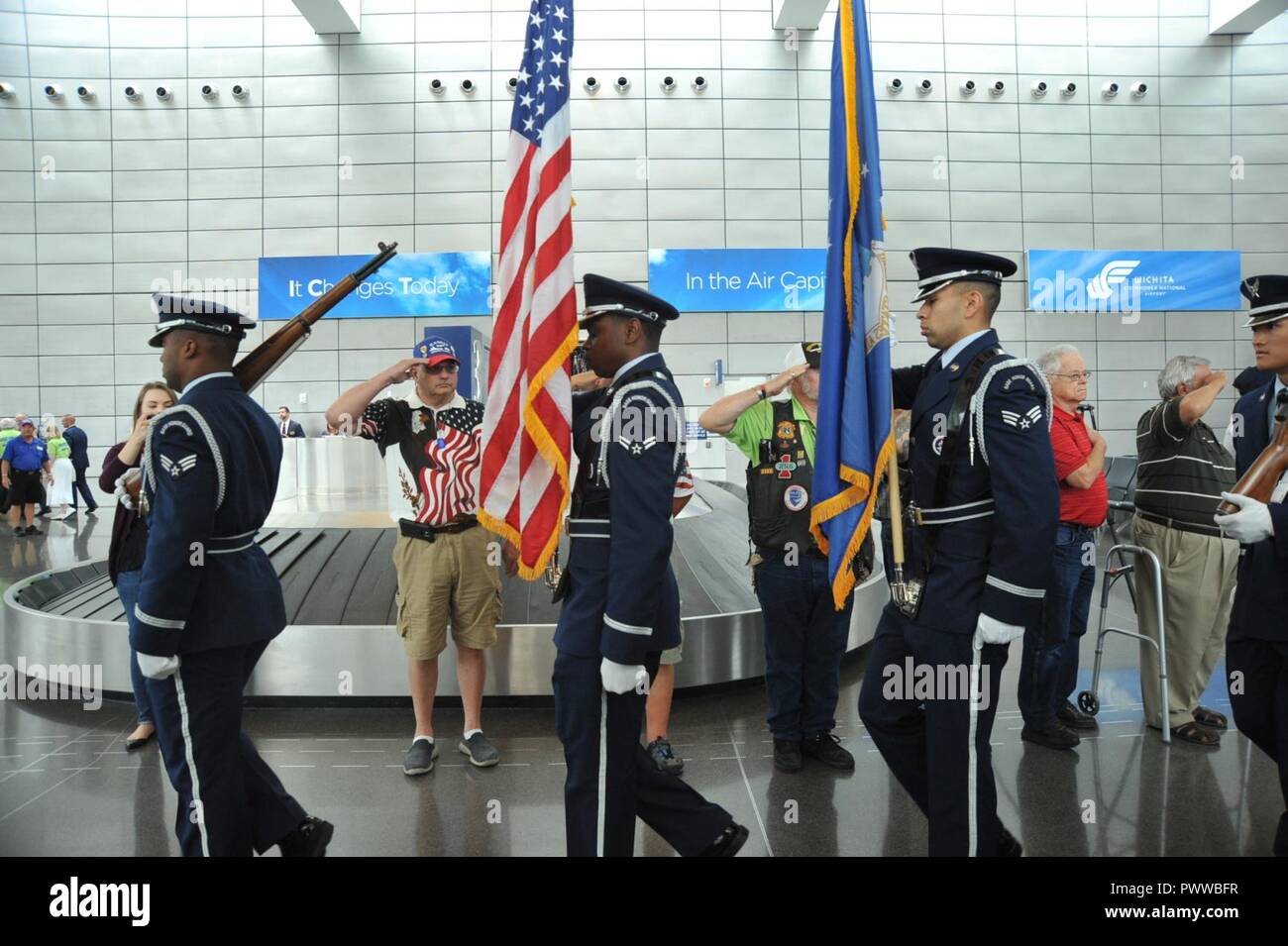 The McConnell Honor guard marches in to place to signal the arrival of ...