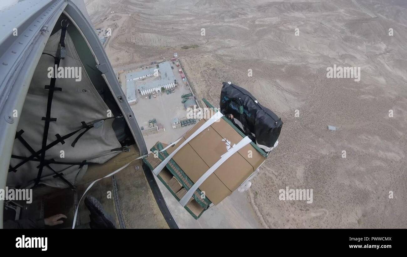 An Afghan Air Force C-208 crew, delivers supplies to Afghan National ...