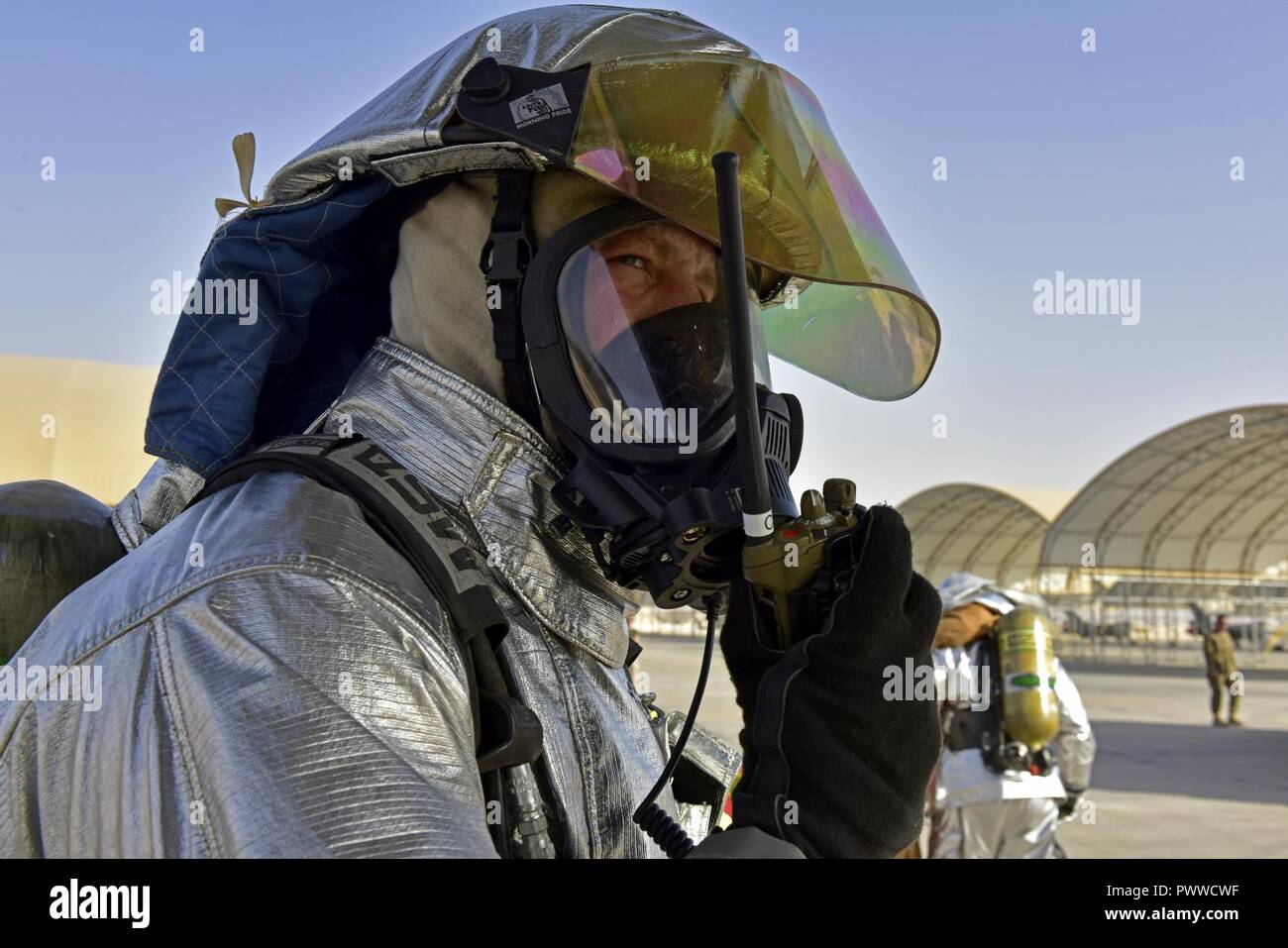 A 407th Expeditionary Civil Engineer Squadron fire department member ...