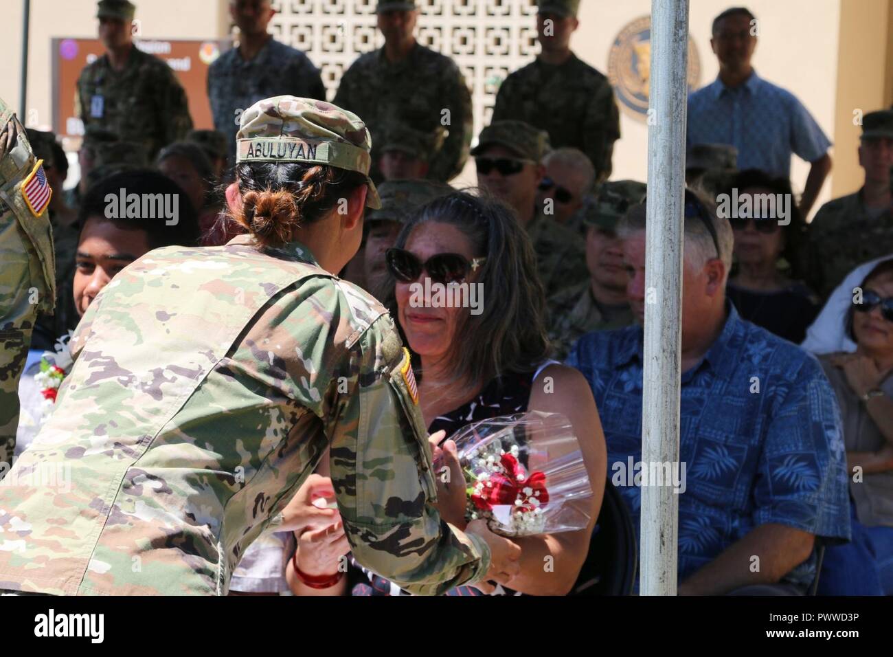 Jessica, wife of Lt. Col. Kenneth Tafao, outgoing commander of the ...