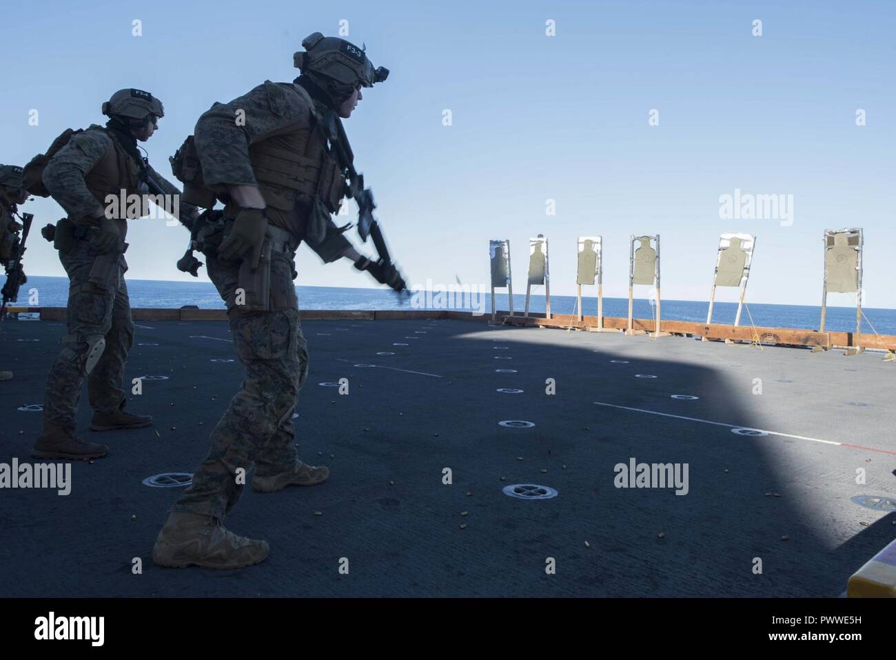 CORAL SEA (July 5, 2017) Sgt. Connor Mooney, from Baltimore, reaches ...