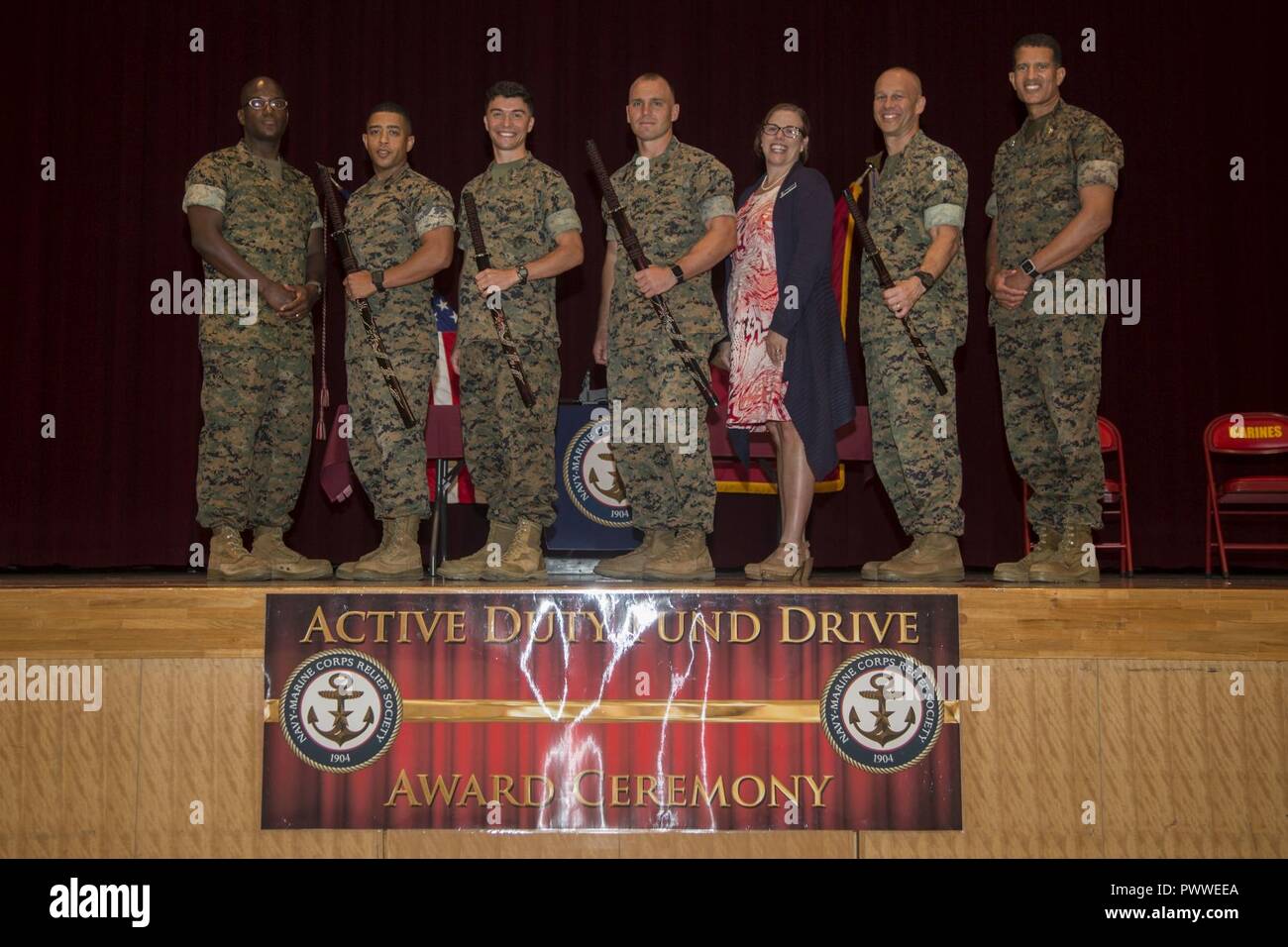 (From left to right) U.S. Marine Corps Master Gunnery Sgt. Tarik Inge ...