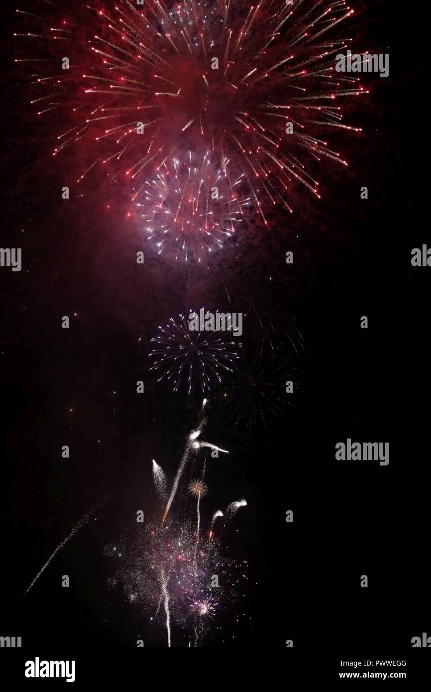 CAMP COURTNEY, OKINAWA, Japan – Fireworks burst in the air at the first ...