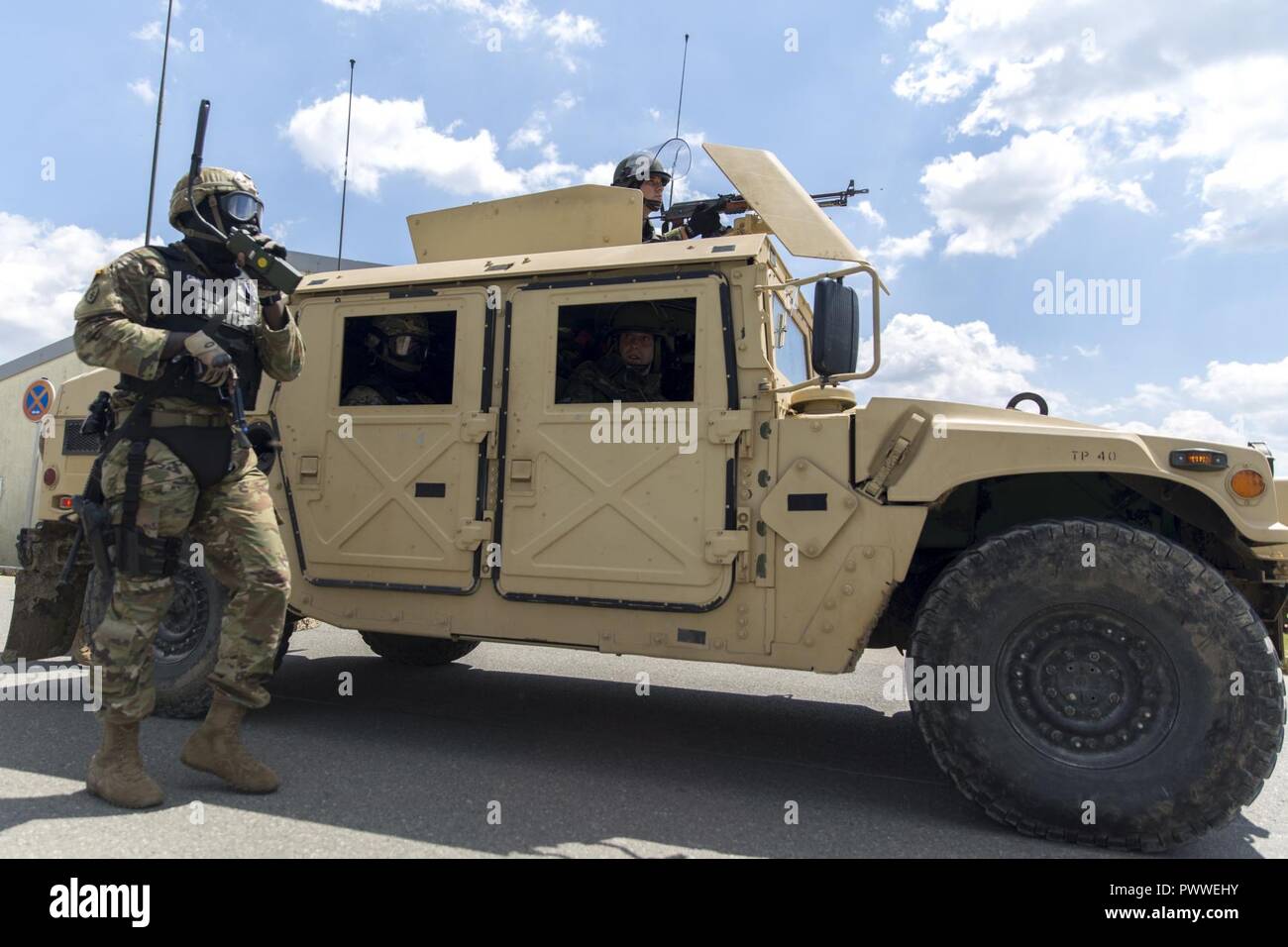 [U.S. Army or Other Nation army] [Rank Name] of [Unit] [describe action ...