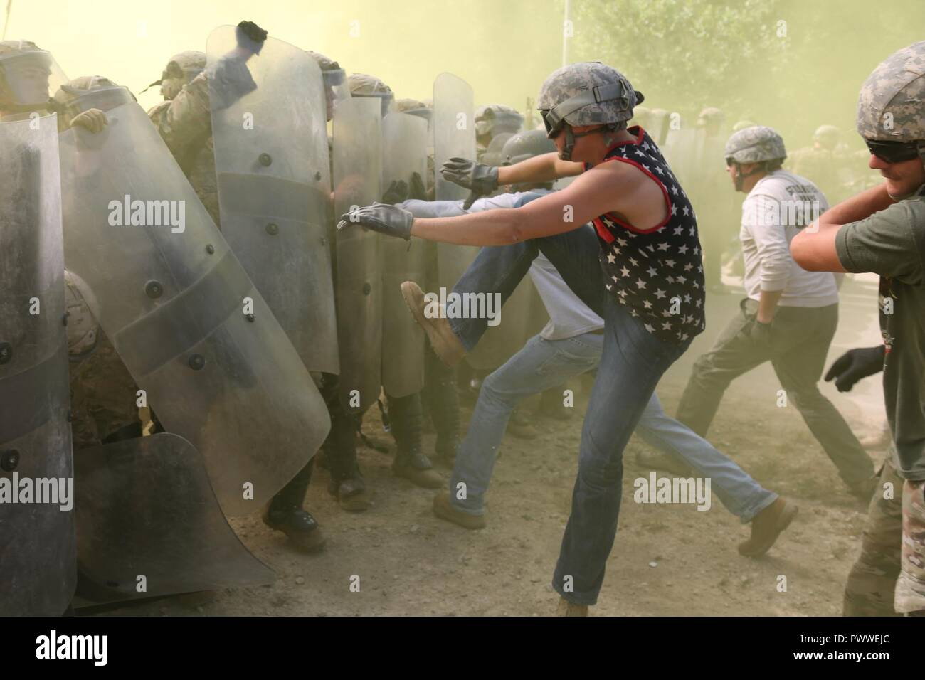 U.S. Soldiers of 1st Battalion, 4th Infantry Regiment attempt to breach ...