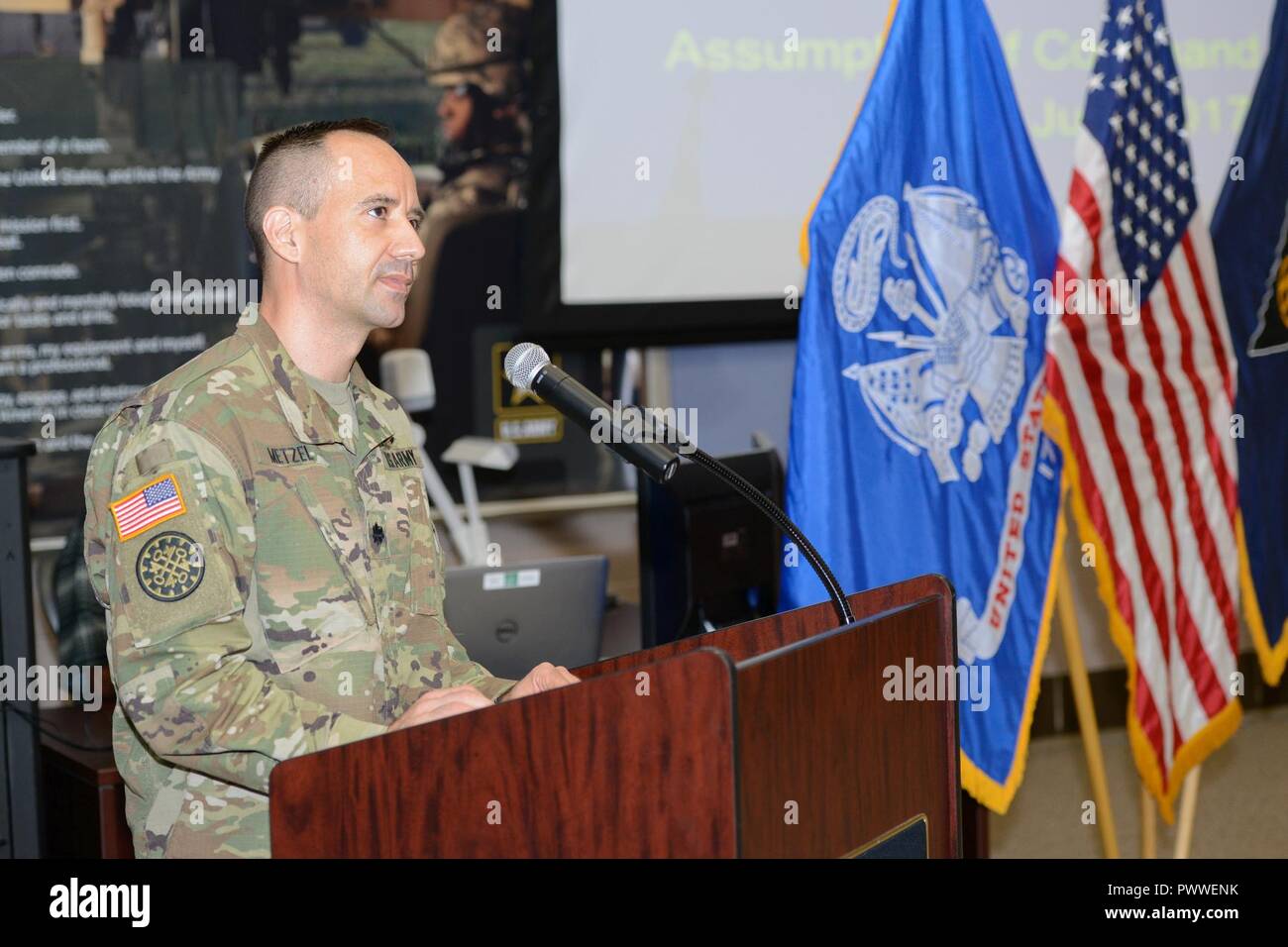 Incoming RTA Commandant LTC Matthew Metzel speaks to the audience ...