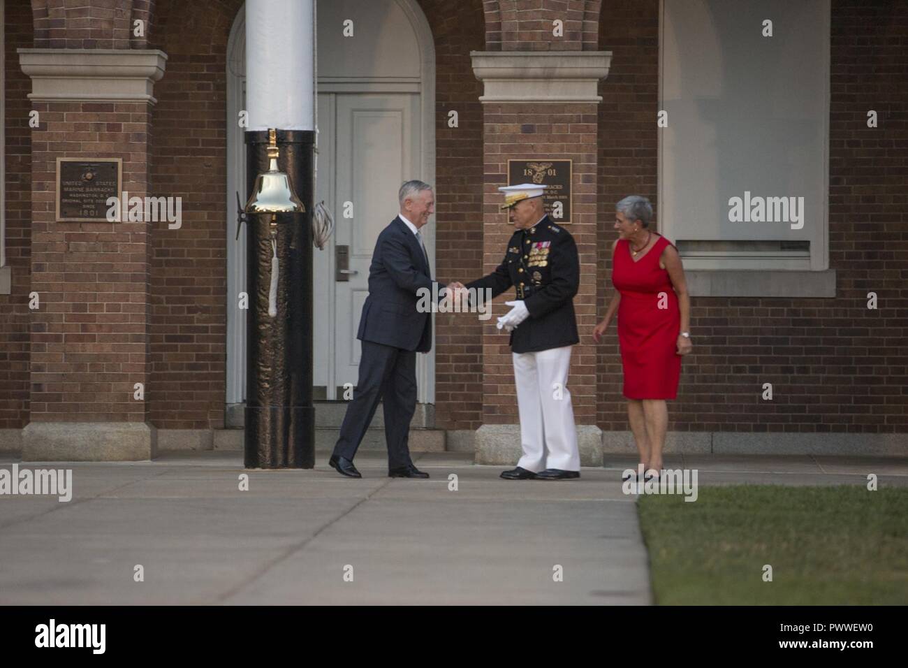 Commandant of the Marine Corps Gen. Robert B. Neller, center, shakes ...