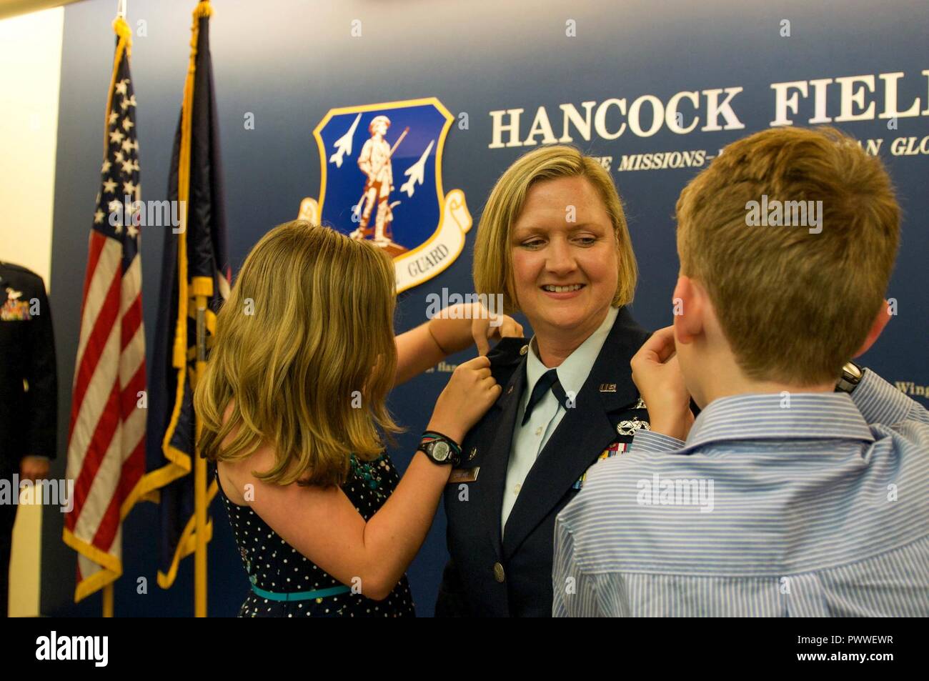 Col. Catherine A. Hutson, 174th Maintenance Group Commander, is pinned ...