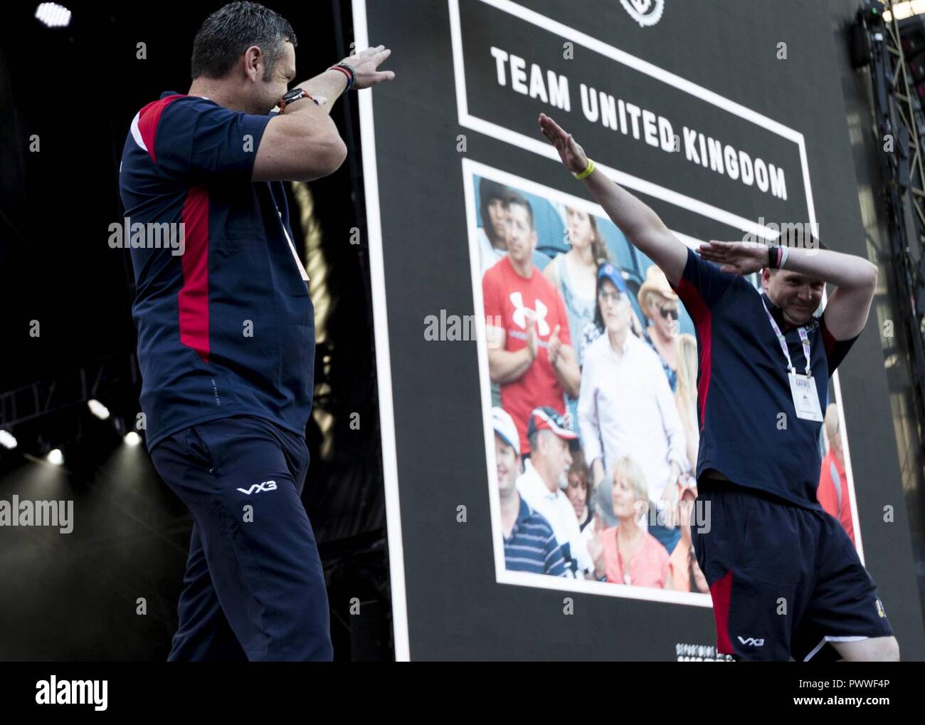 Daniel Grobler and Pete Lauder of Team United Kingdom "dab" as they ...