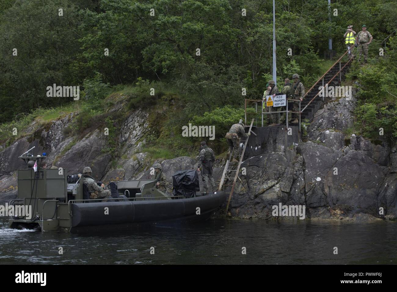 U.S. Marines board an offshore riding craft during Exercise Phoenix ...